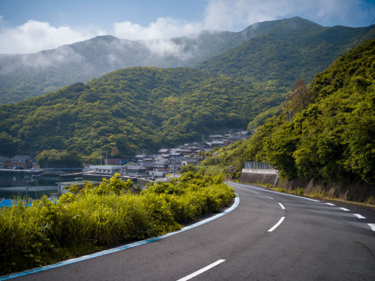 Winding Mountain Road Through Lush Green Landscape | Offbeat Japan